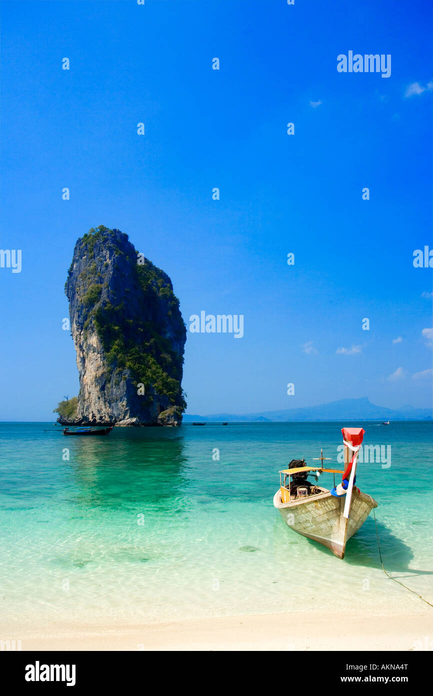 Boat anchored at beach Ko Poda in background Laem Phra Nang Railay ...