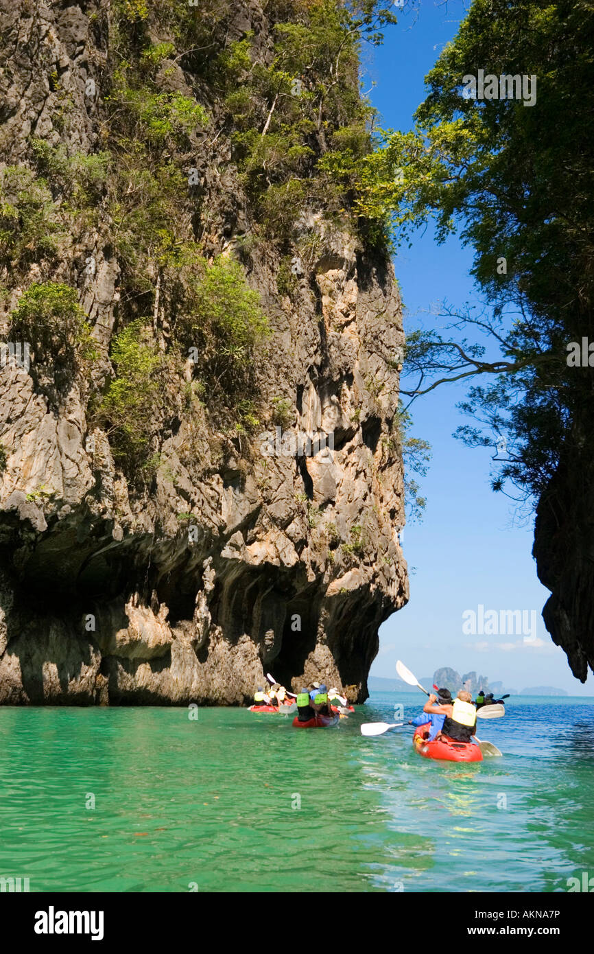 Tourists kayaking Ko Hong Island lagoon Phang Nga bay Krabi Thailand ...