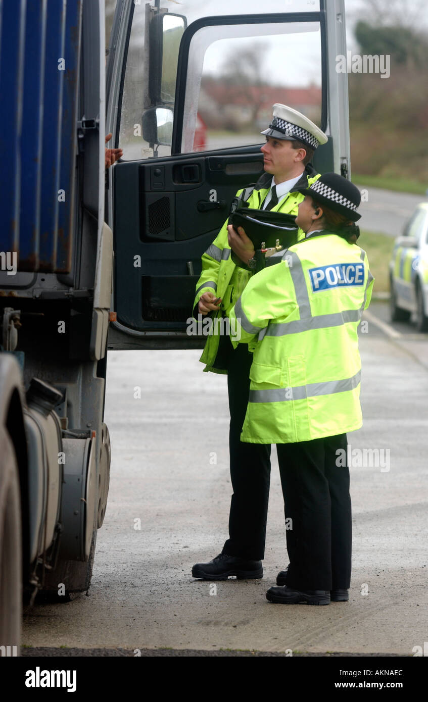 Traffic Police carrying out stop checks on vehicles Stock Photo - Alamy