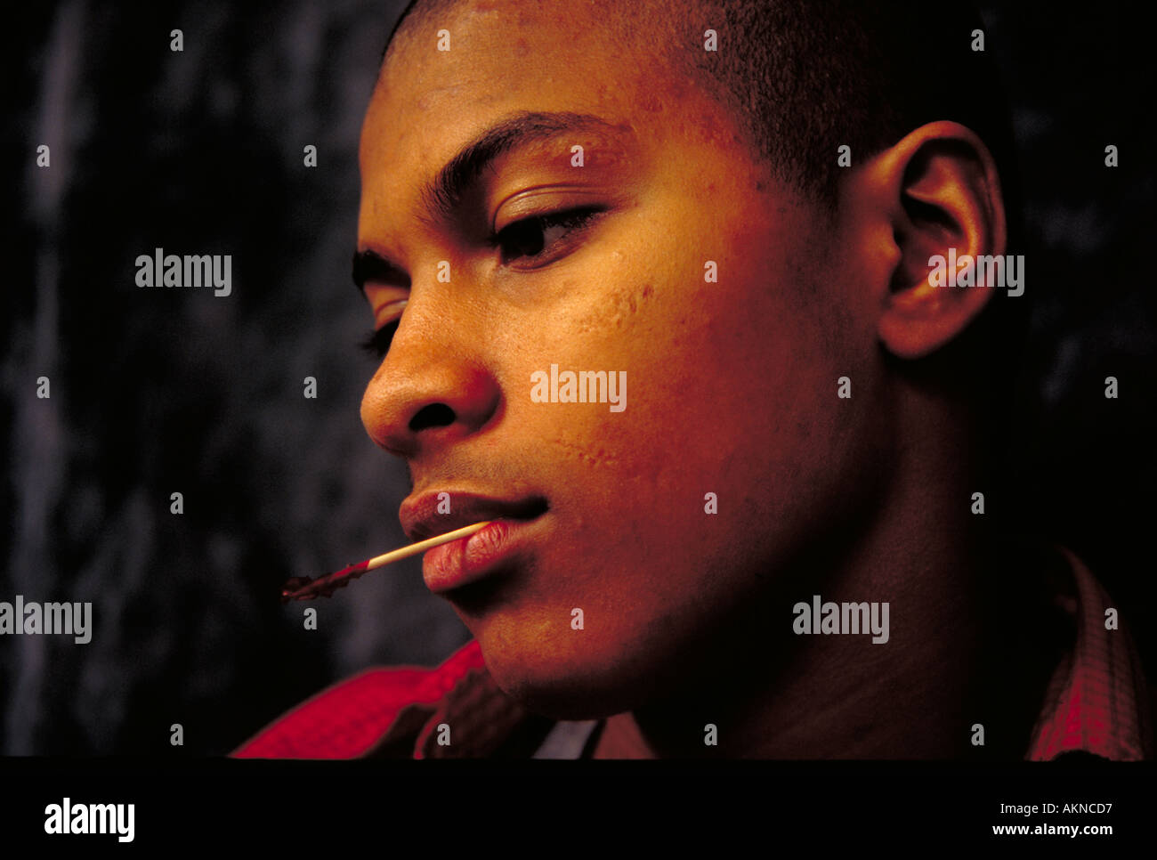 Serious african boy teenager hi-res stock photography and images - Alamy