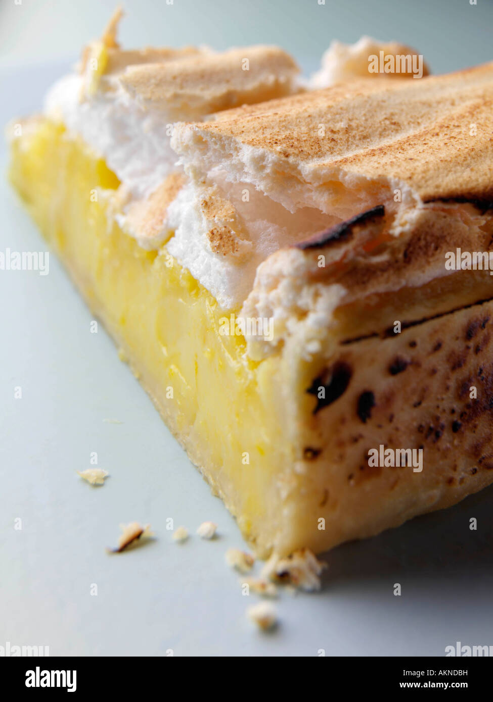 A slice of English lemon meringue pie editorial food Stock Photo - Alamy