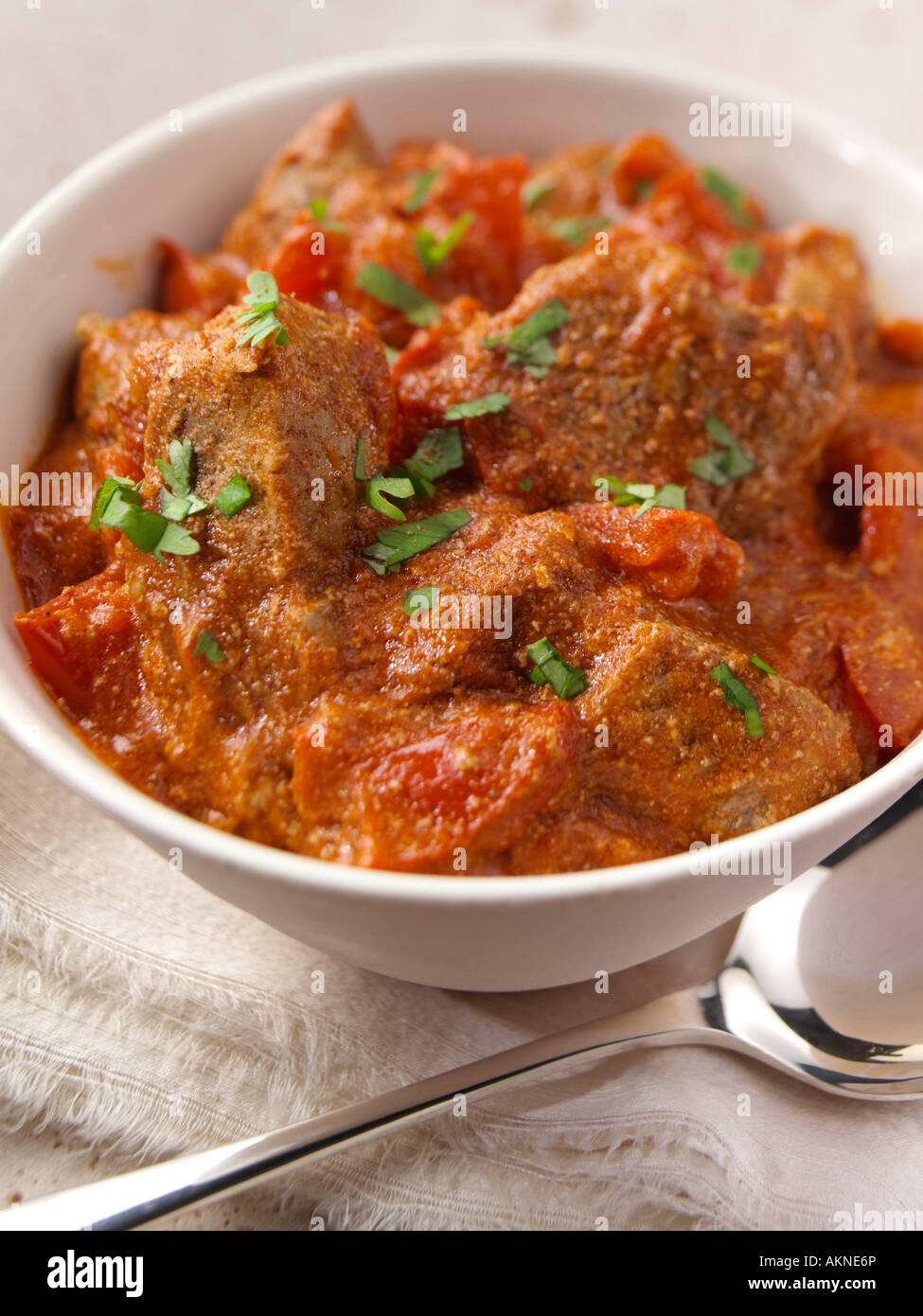 A bowl of Indian spicy Rogan Josh editorial food Stock Photo - Alamy