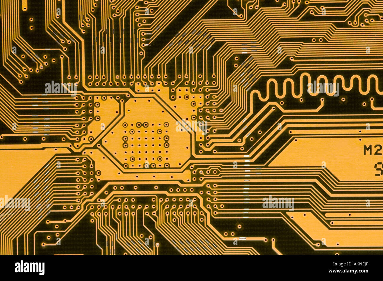 Digital technology close up photograph of gold coloured computer ...