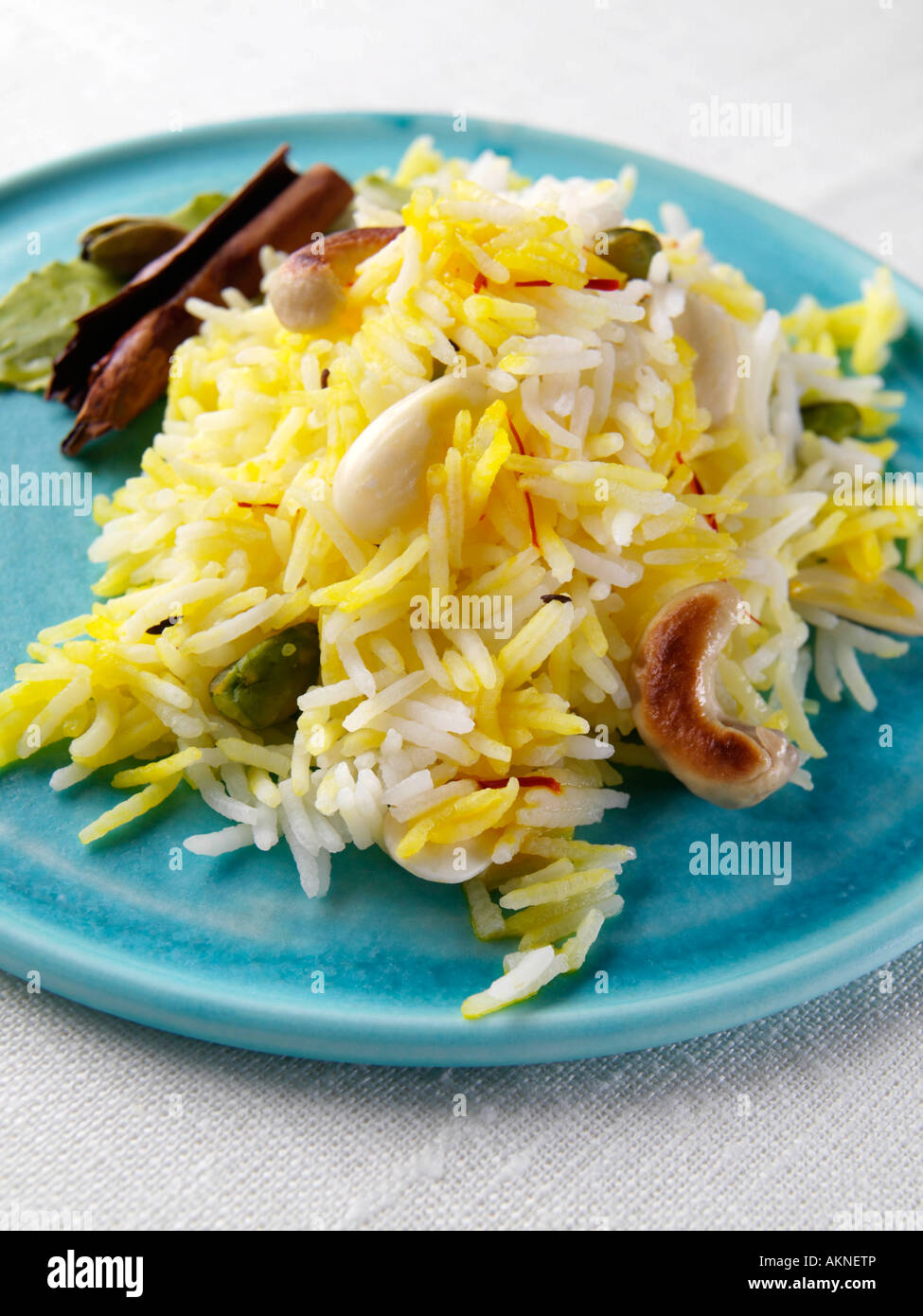 A dish of Indian vegetarian saffron rice editorial food Stock Photo - Alamy