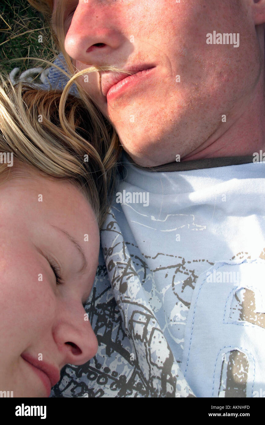 Girl resting on boys chest hi-res stock photography and images - Alamy