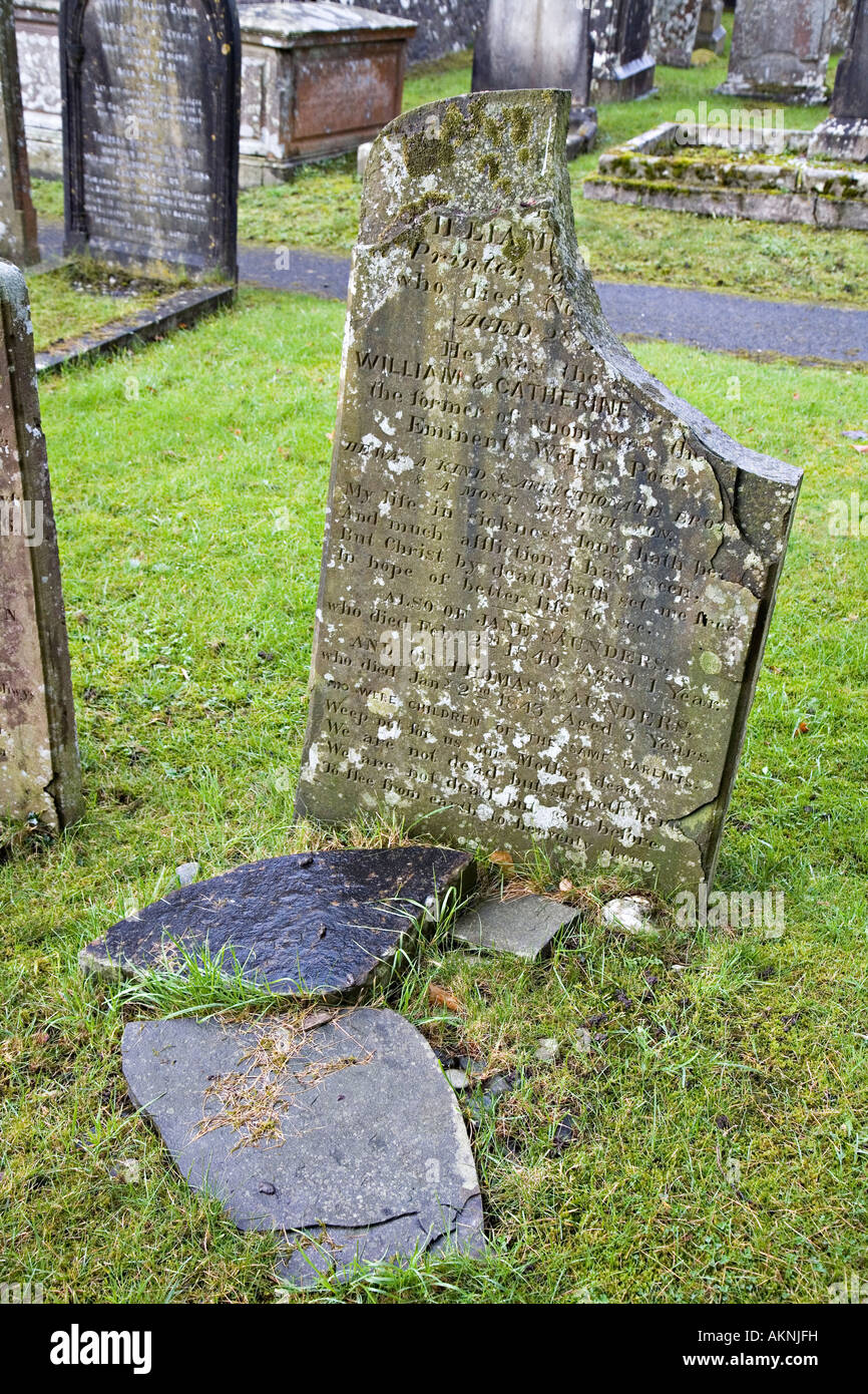 Broken gravestone of large family Llandovery Wales UK Stock Photo - Alamy