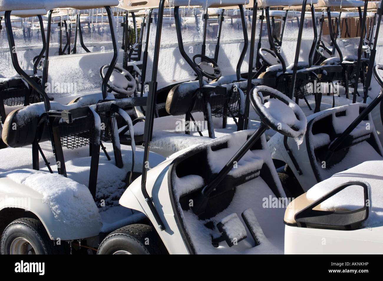 Golf carts covered with snow Stock Photo - Alamy