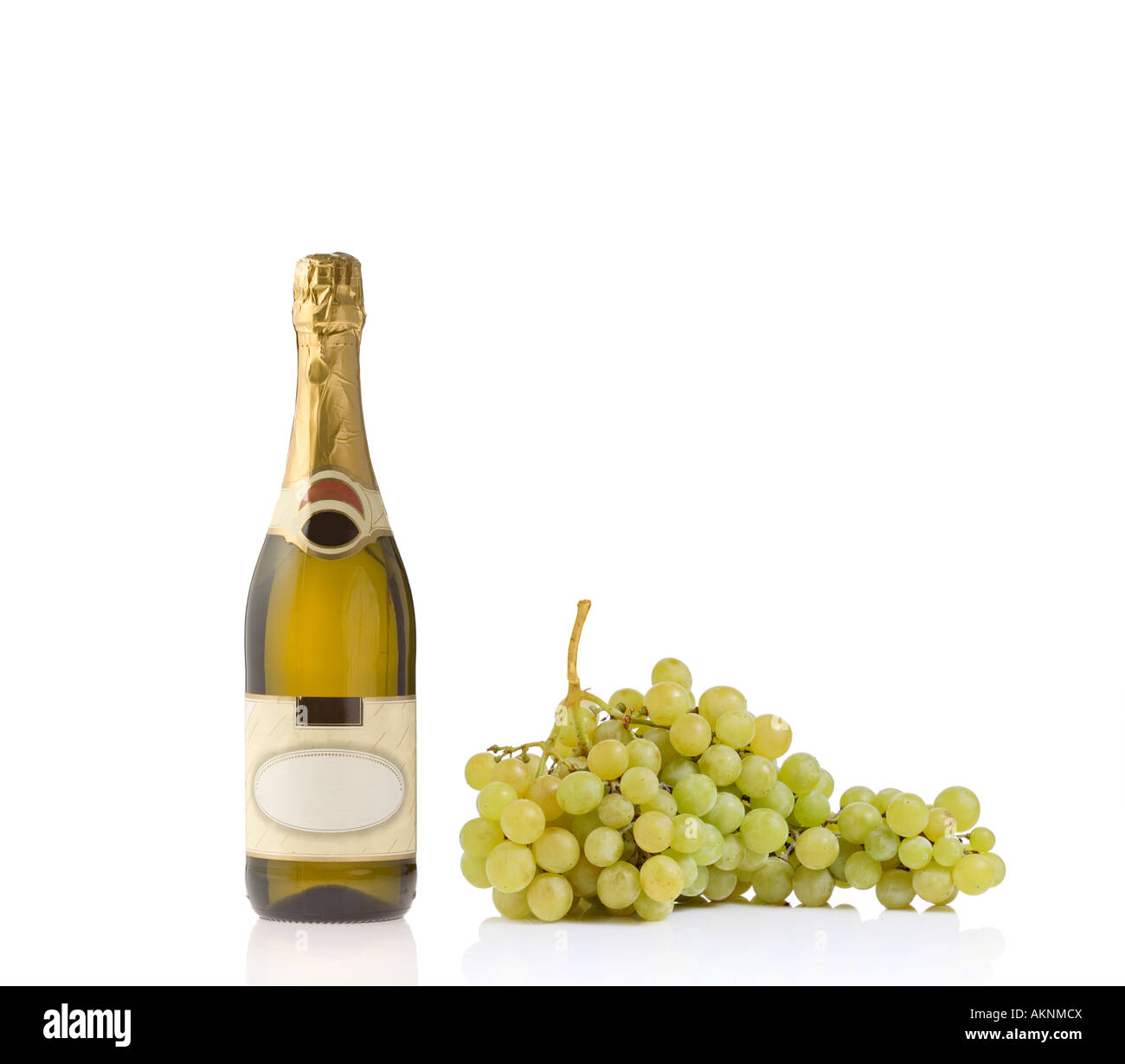 Champagne bottle and grapes Stock Photo - Alamy