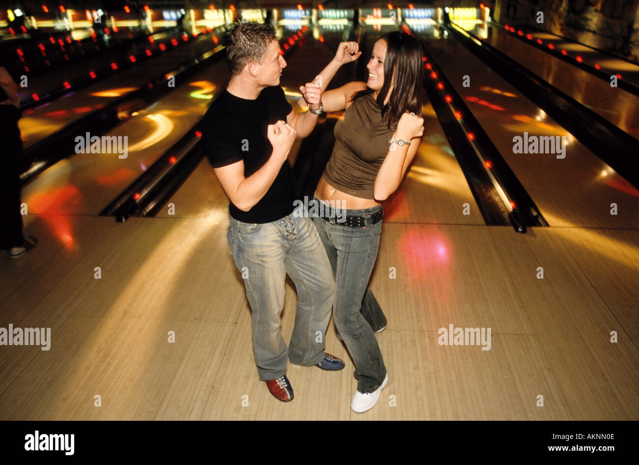 Germany Free time Young persons bowling at the bowling alley Stock ...