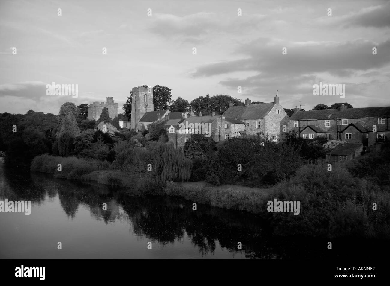 A view of West Tanfield village looking across the River Ure in North ...