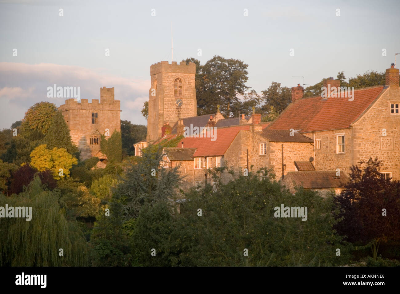 A view of West Tanfield village looking across the River Ure in North ...