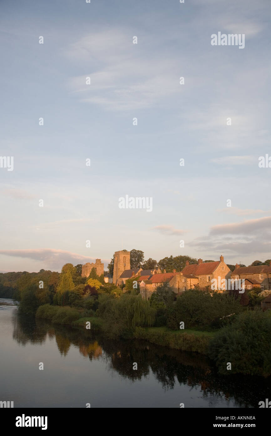 A view of West Tanfield village looking across the River Ure in North ...