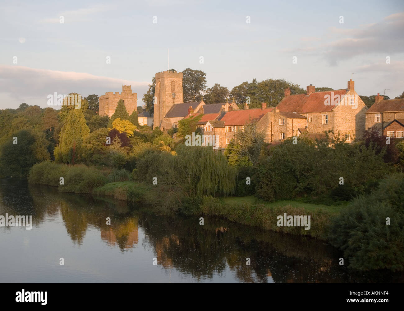 A view of West Tanfield village looking across the River Ure in North ...