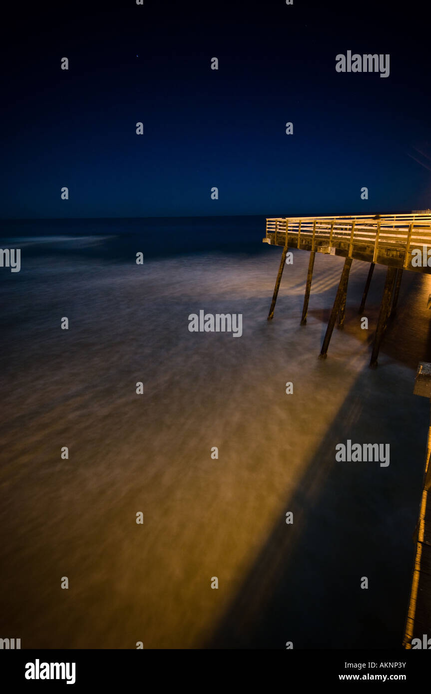 Pier at night Stock Photo - Alamy