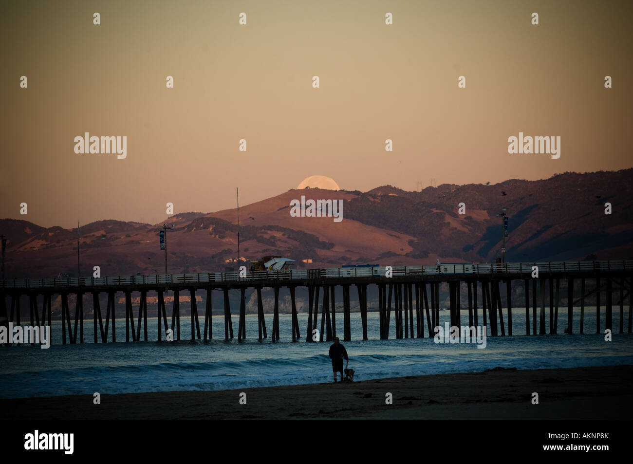 Pier at moonrise Stock Photo - Alamy