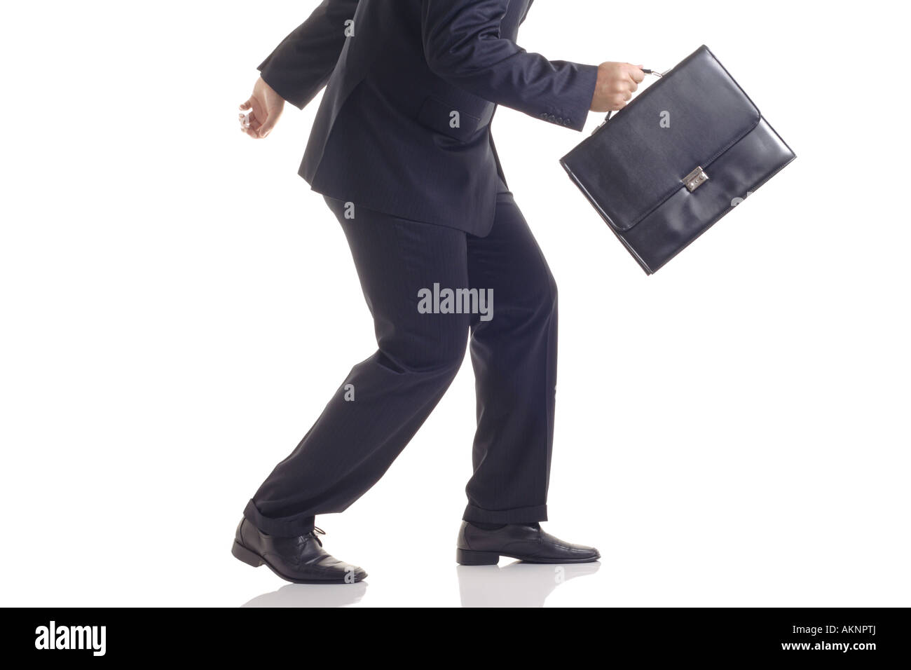 Businessman running away Stock Photo - Alamy