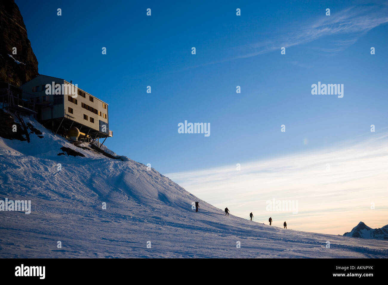 Glacier hikers Monchsjoch hut Grindelwald Bernese Oberland highlands ...