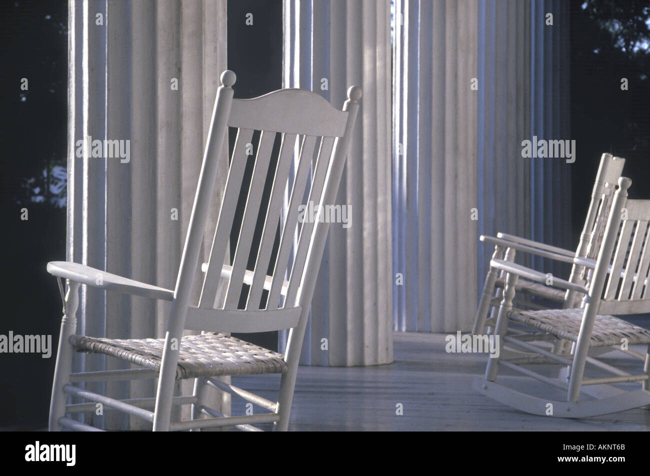 Rocking Chairs On Porch Columns Stock Photo - Alamy