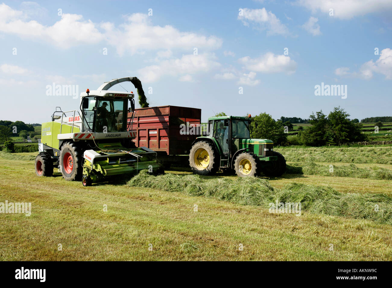 Harvesting grass for silage in Yorkshire England UK farming Stock Photo ...
