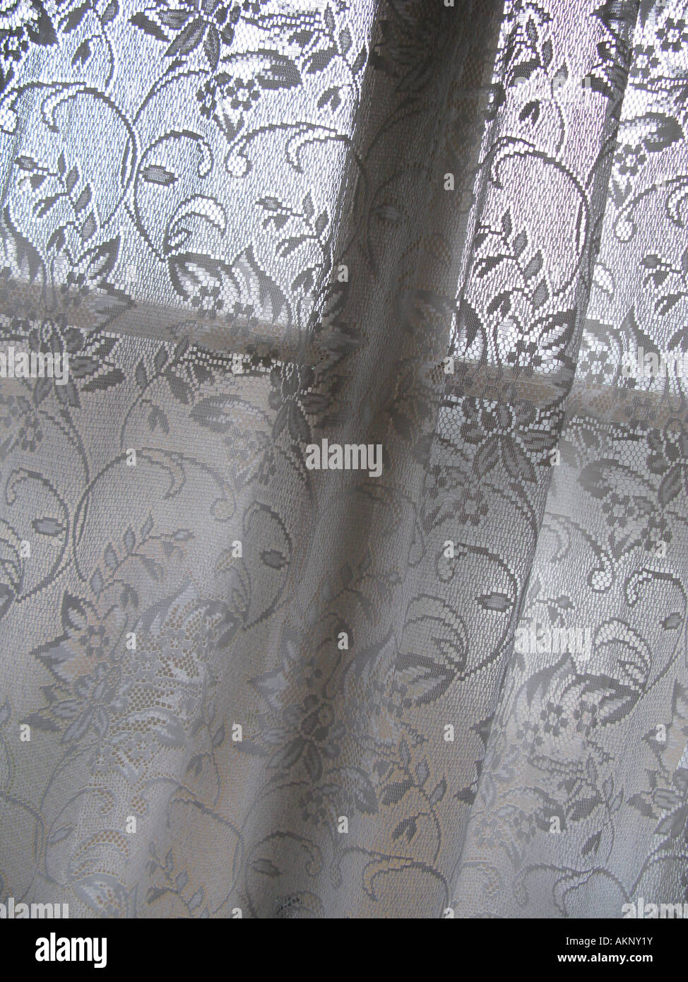WINDOW WITH NET CURTAIN Stock Photo - Alamy
