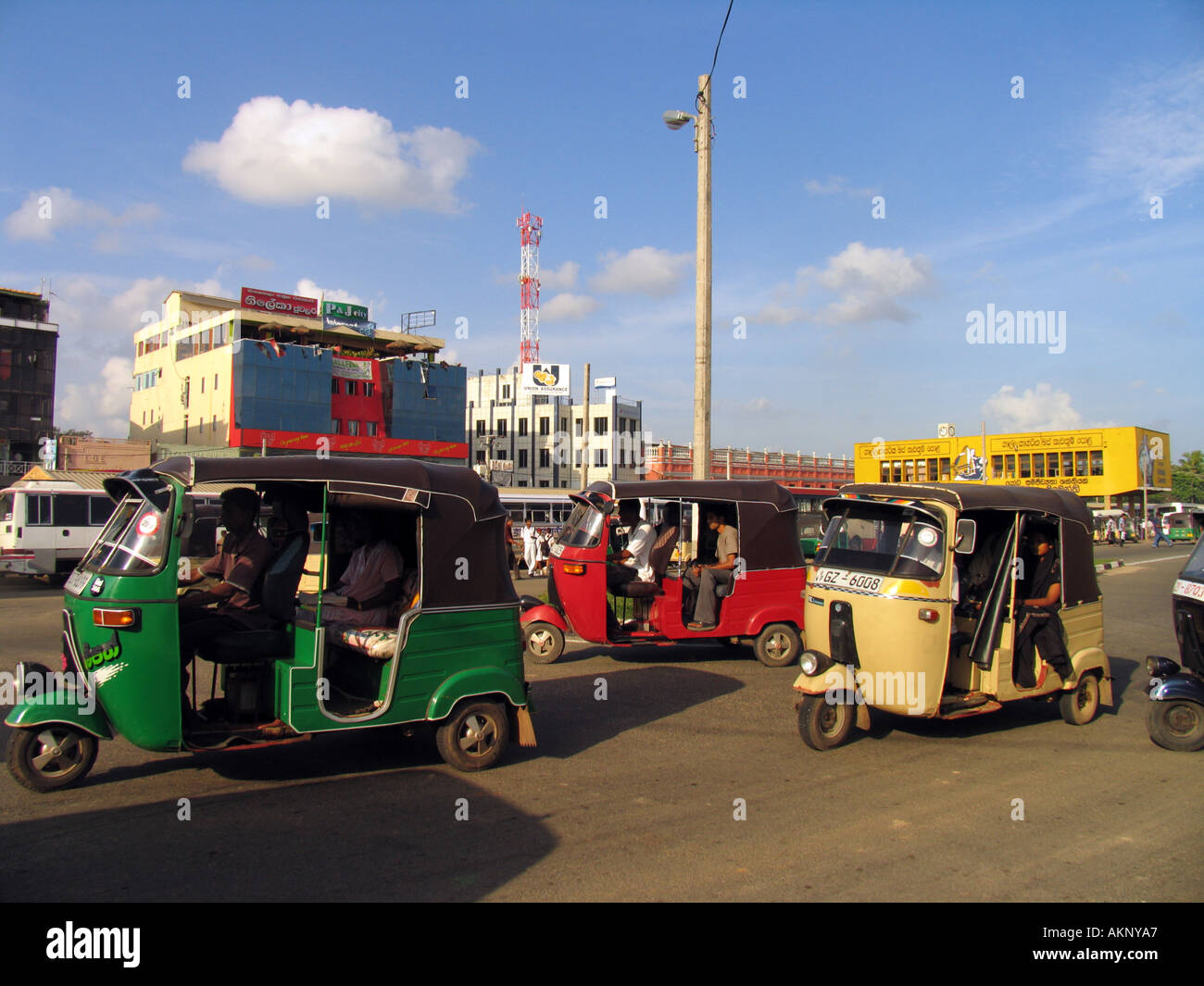 Green yellow tuk tuks hi-res stock photography and images - Alamy