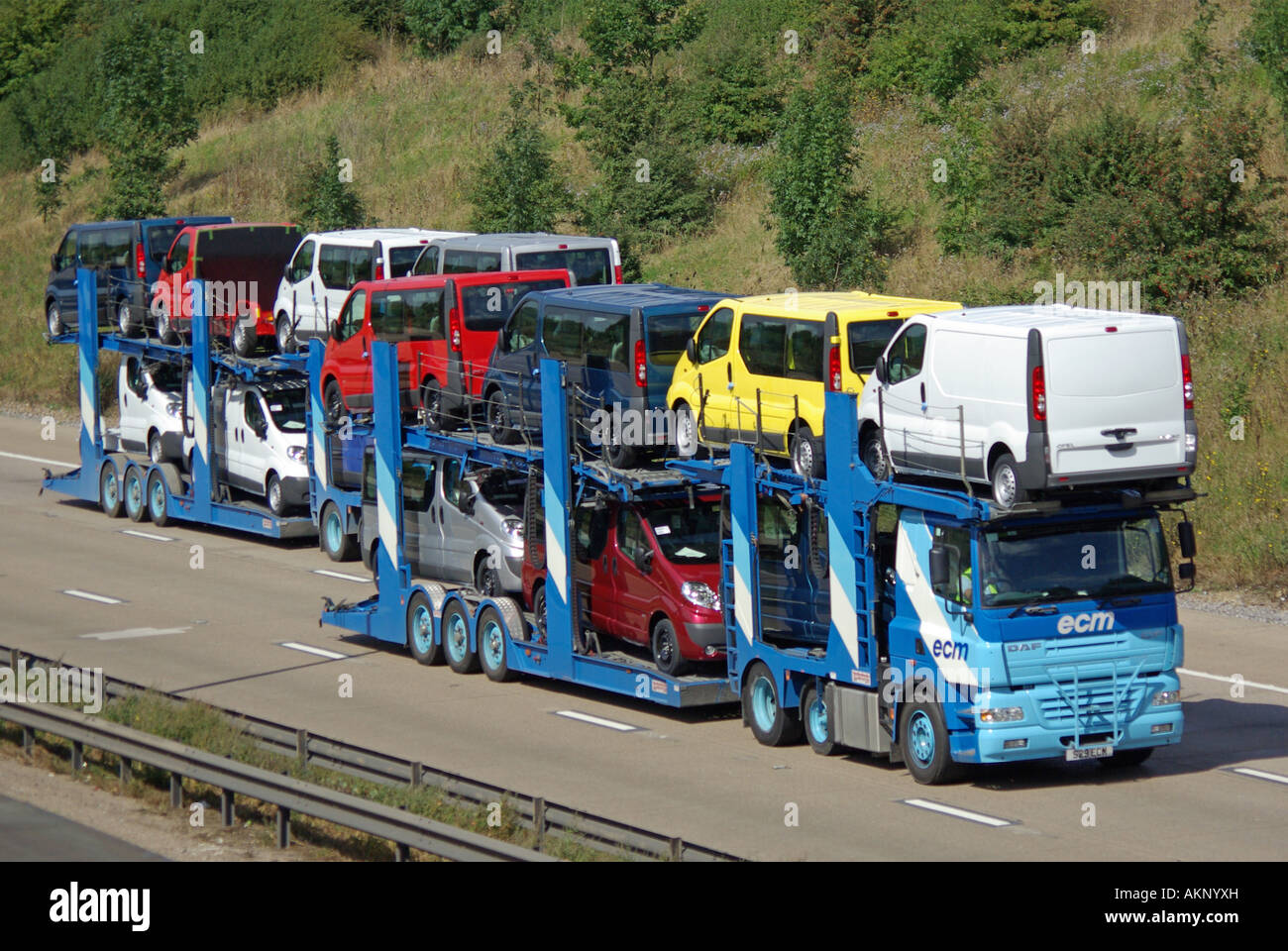 Two ECM loaded Opel van delivery transporter lorries overtaking on M25 ...
