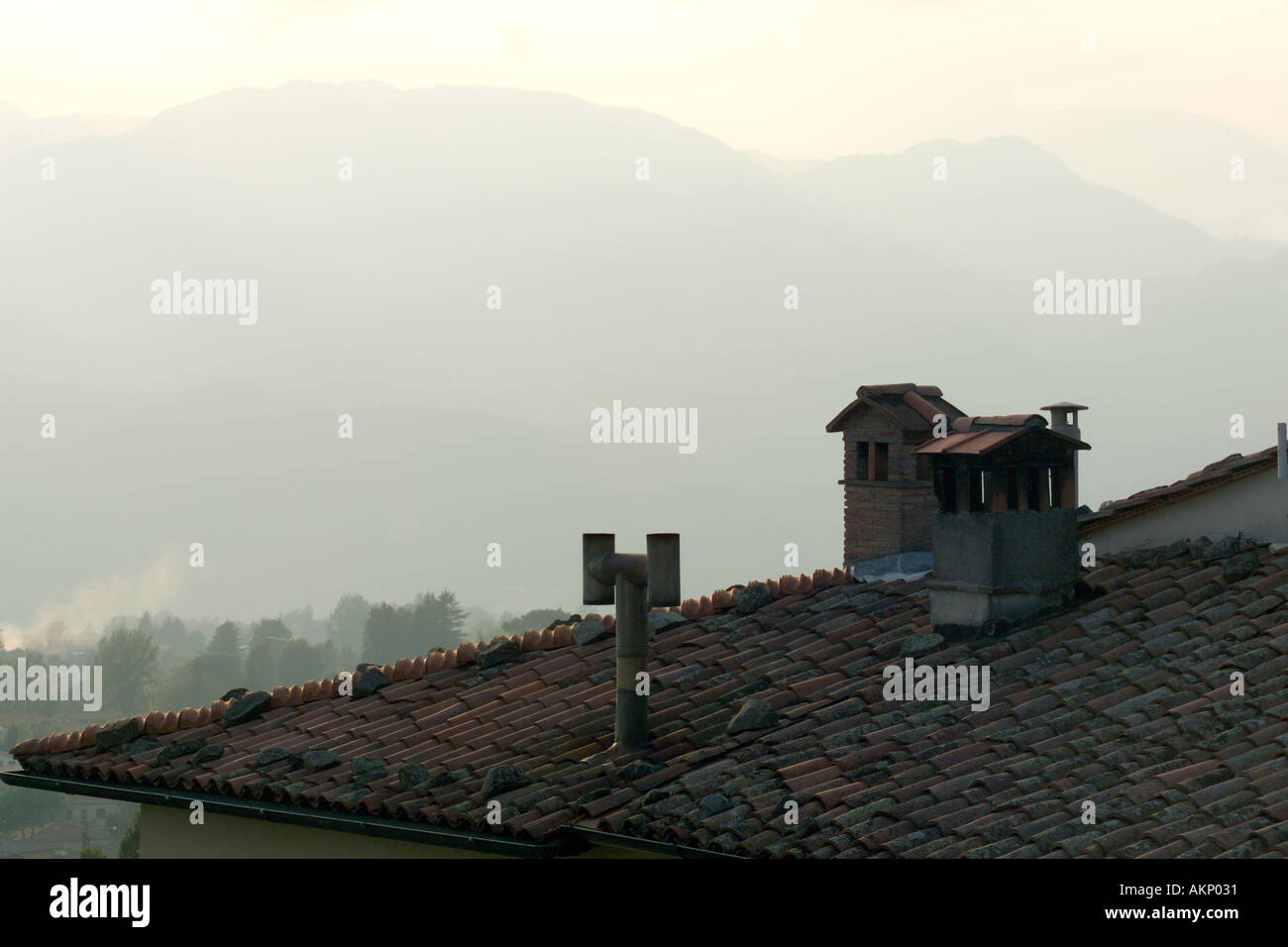 Barga Tuscany Italy view across ancient hill top city with tiled rooves ...