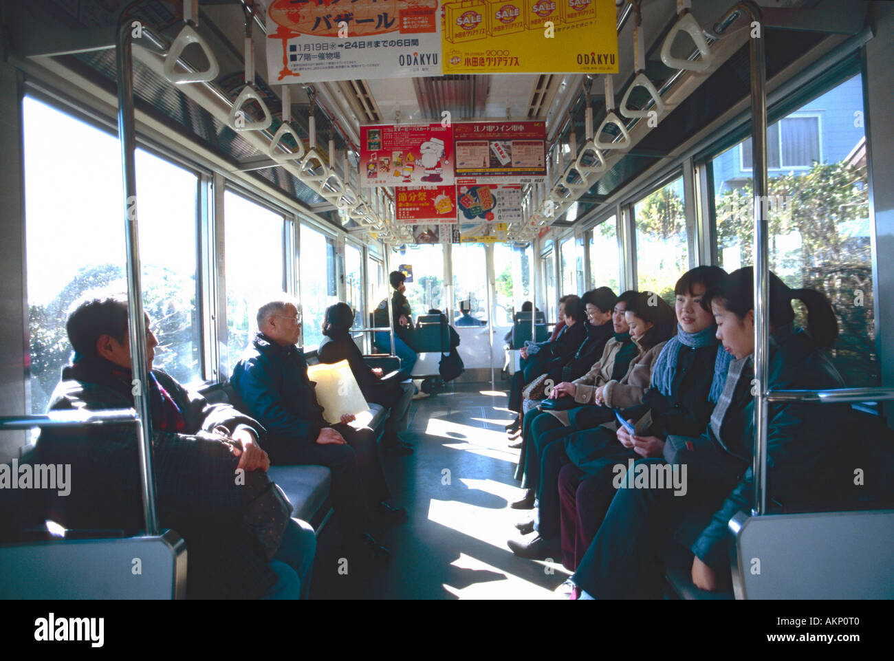 train with passengers, Kamakura, Japan Stock Photo - Alamy