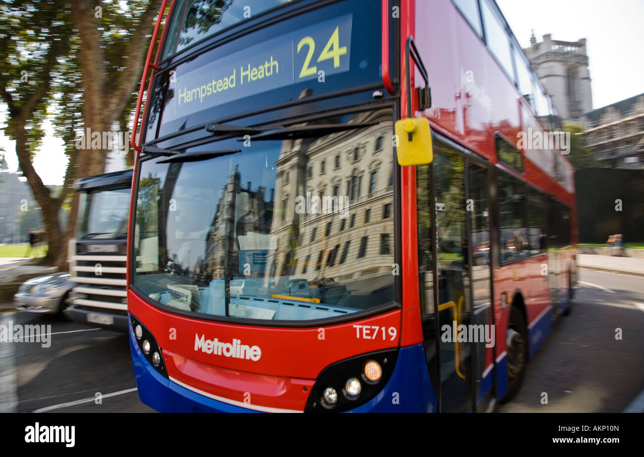 Close-up of the front of a London bus negotiating Parliament Square ...