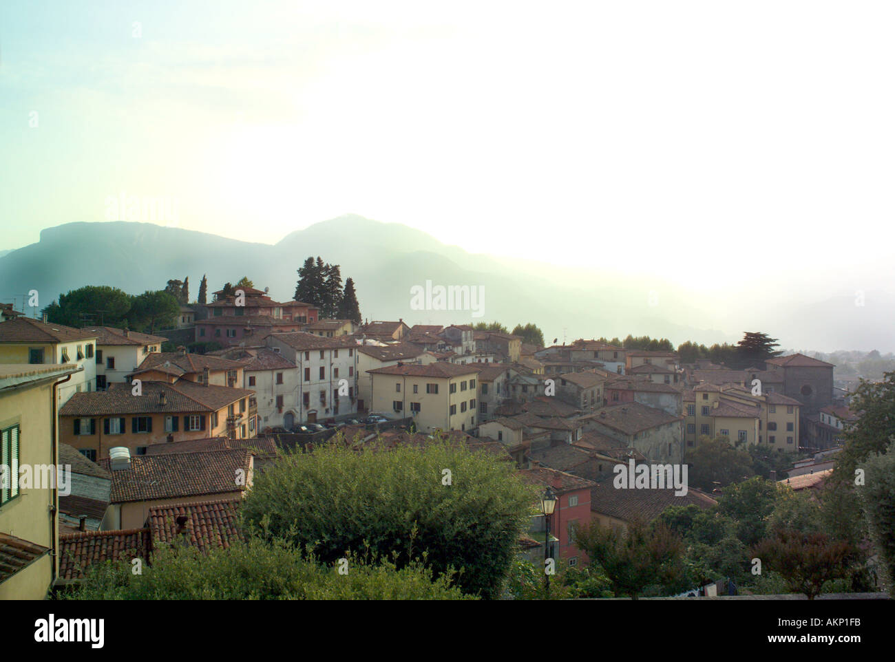 Barga Tuscany Italy view across ancient hill top city with tiled rooves ...