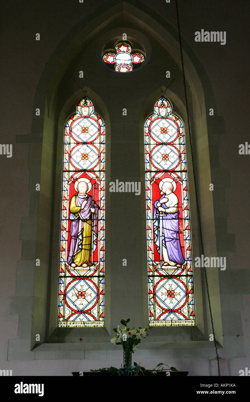 Stained glass window in a typical ancient catholic church UK Stock ...