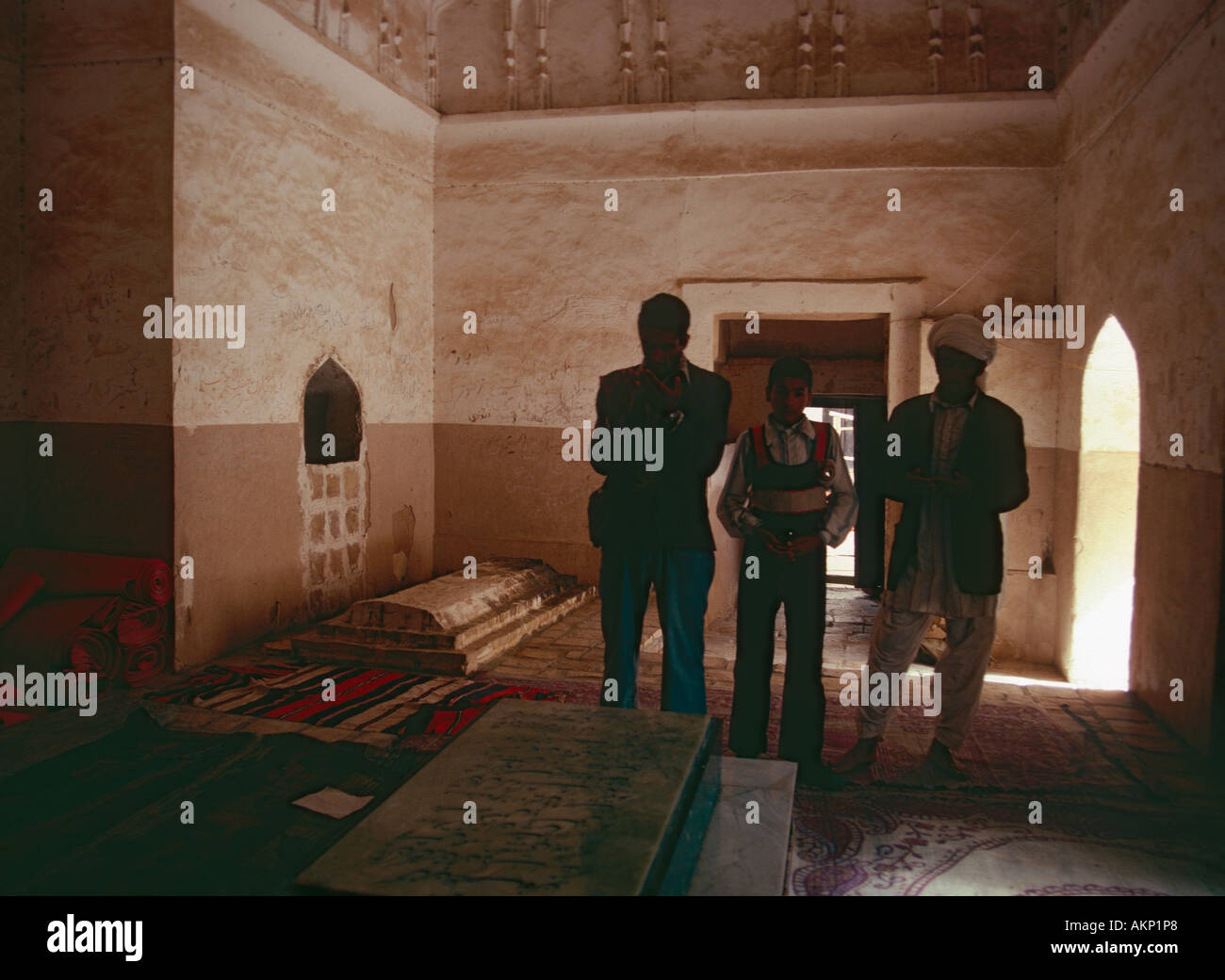 Turbat-i Jam, shrine of Ahmad-i Jam, pilgrims praying at grave Stock ...