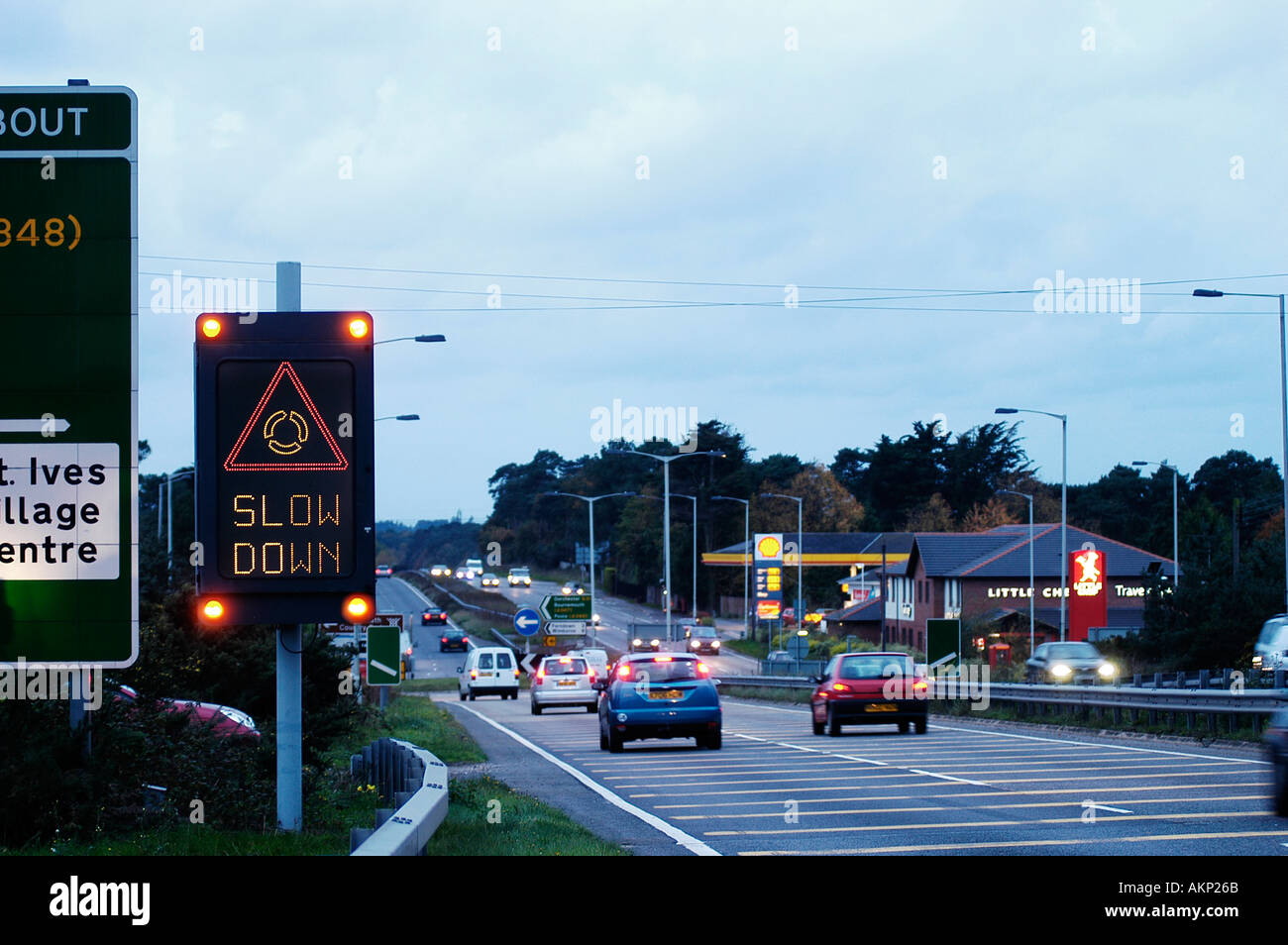 Reactive road sign warning of a roundabout Stock Photo - Alamy