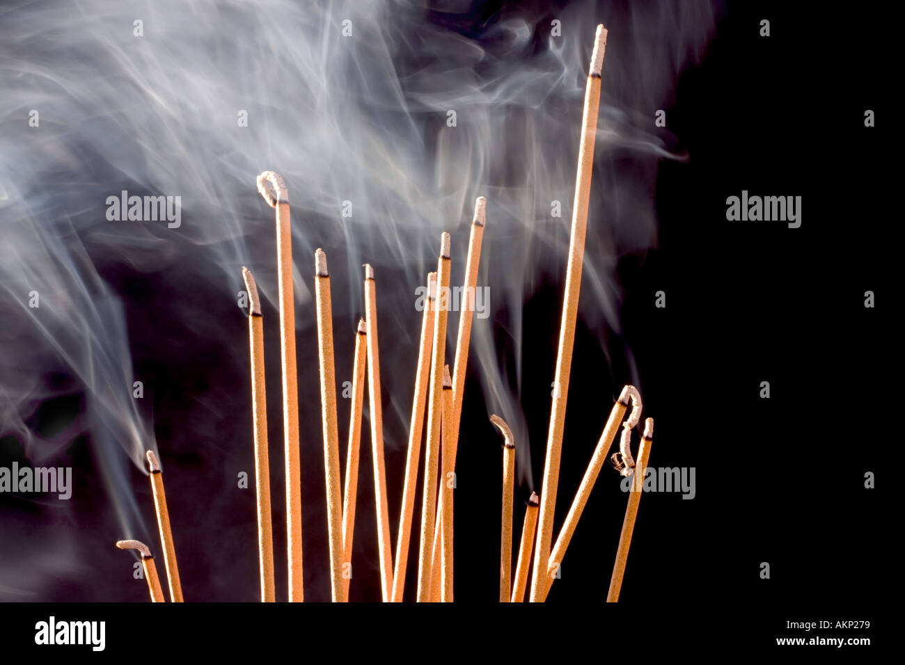 Smoking Buddhist Joss Sticks Stock Photo - Alamy