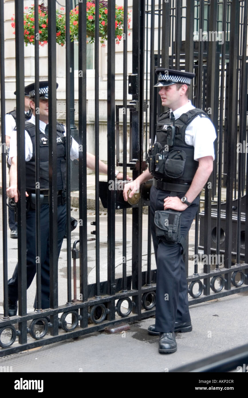 Police officers guarding the gates at Downing Street in London UK Stock ...