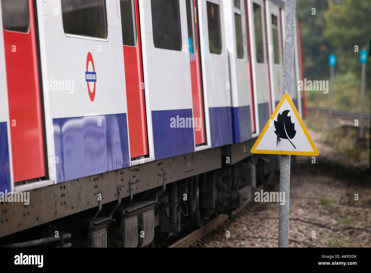 Traffic sign warning about leaves on tracks Stock Photo - Alamy