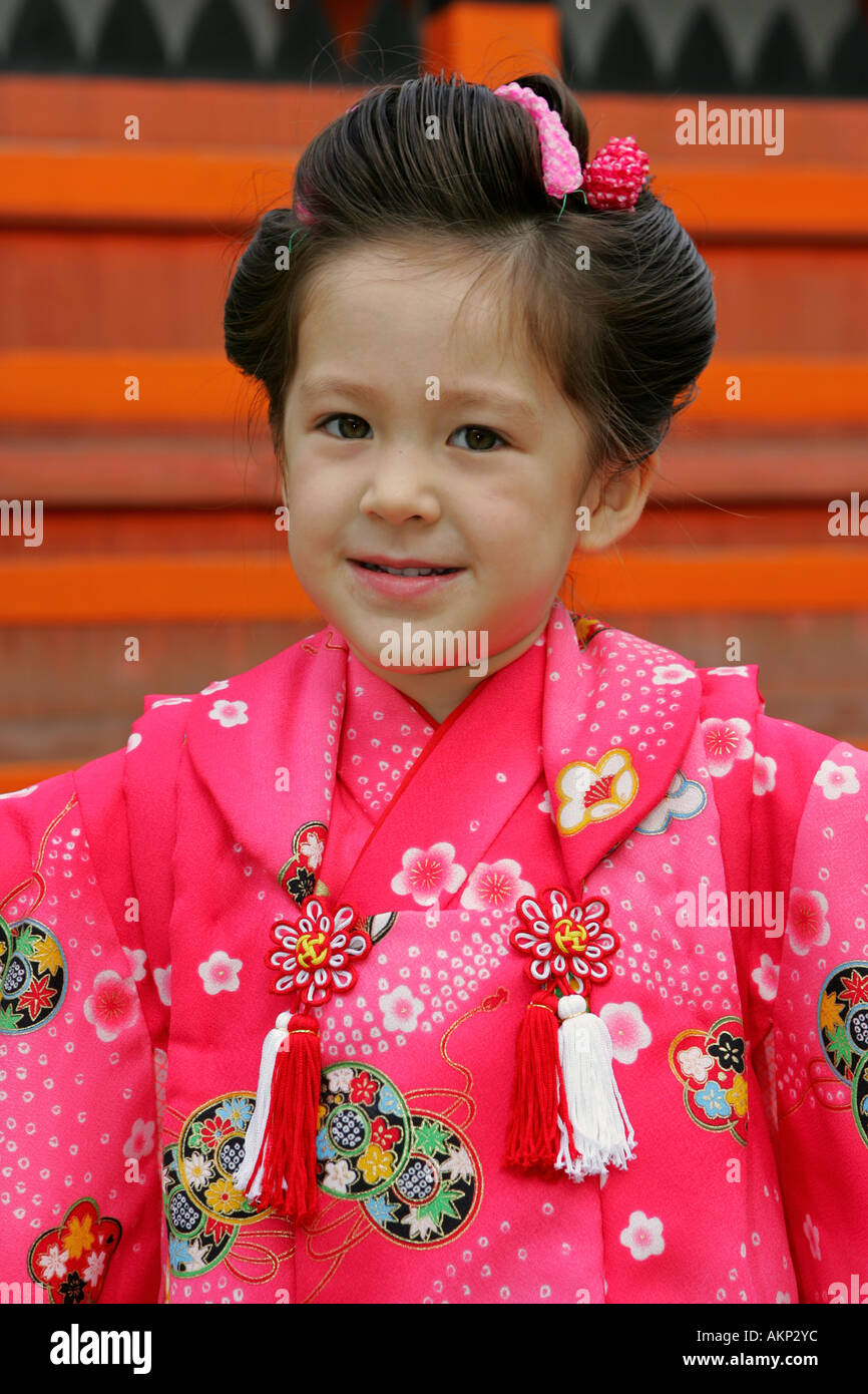 Cute Japanese Australian multicultural mixed race young girl dressed in ...