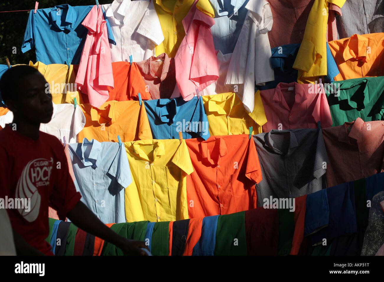 colourful clothes at an african market Stock Photo - Alamy
