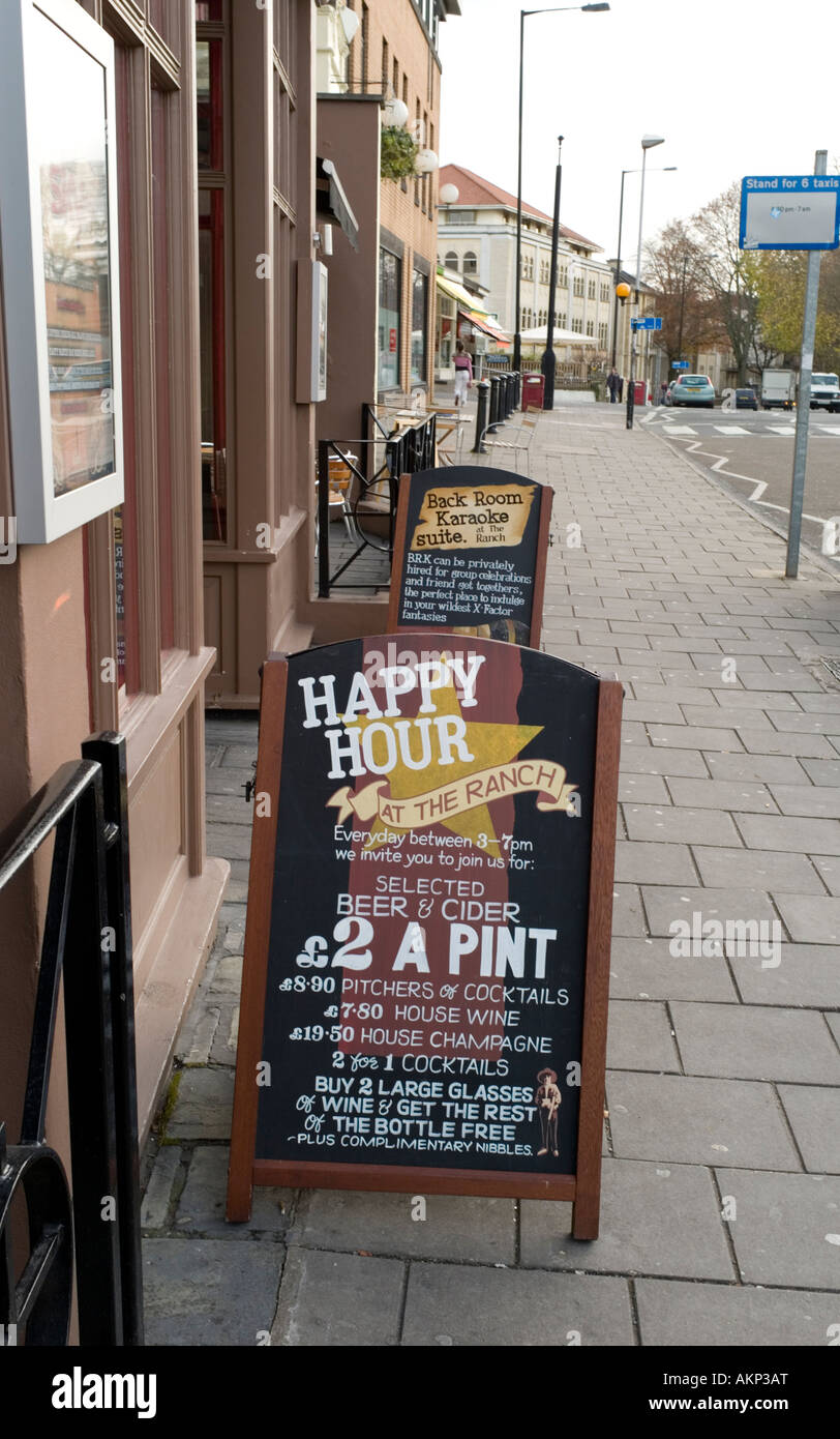Happy Hour sign outside a bar UK Stock Photo - Alamy