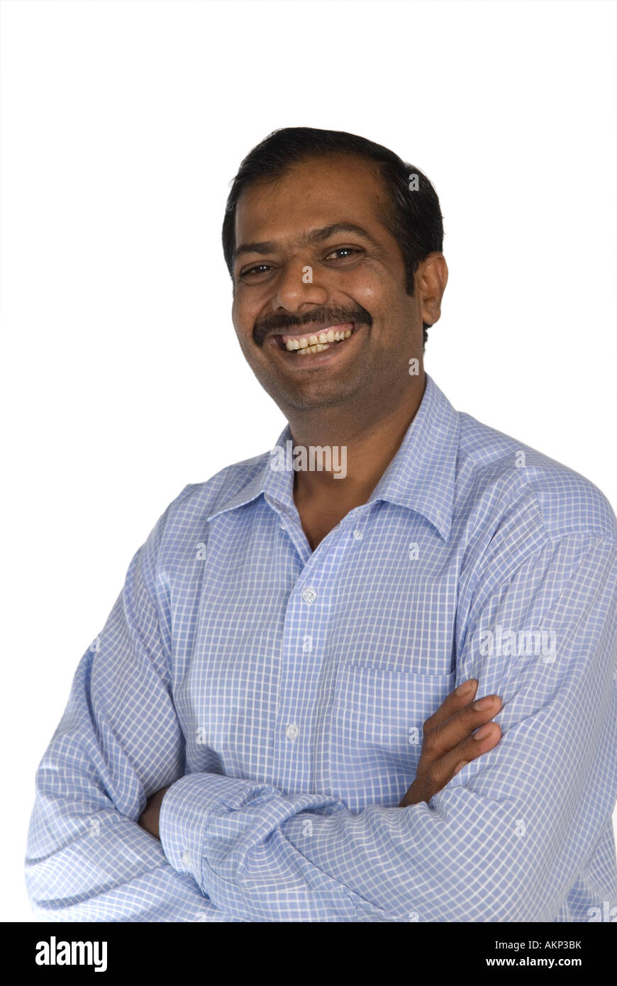 Happy Indian man arms folded Stock Photo - Alamy