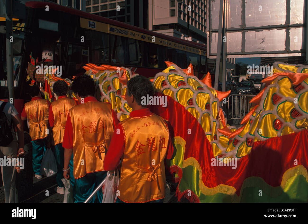 Chinese Dragon Waiting to get on a bus Stock Photo - Alamy