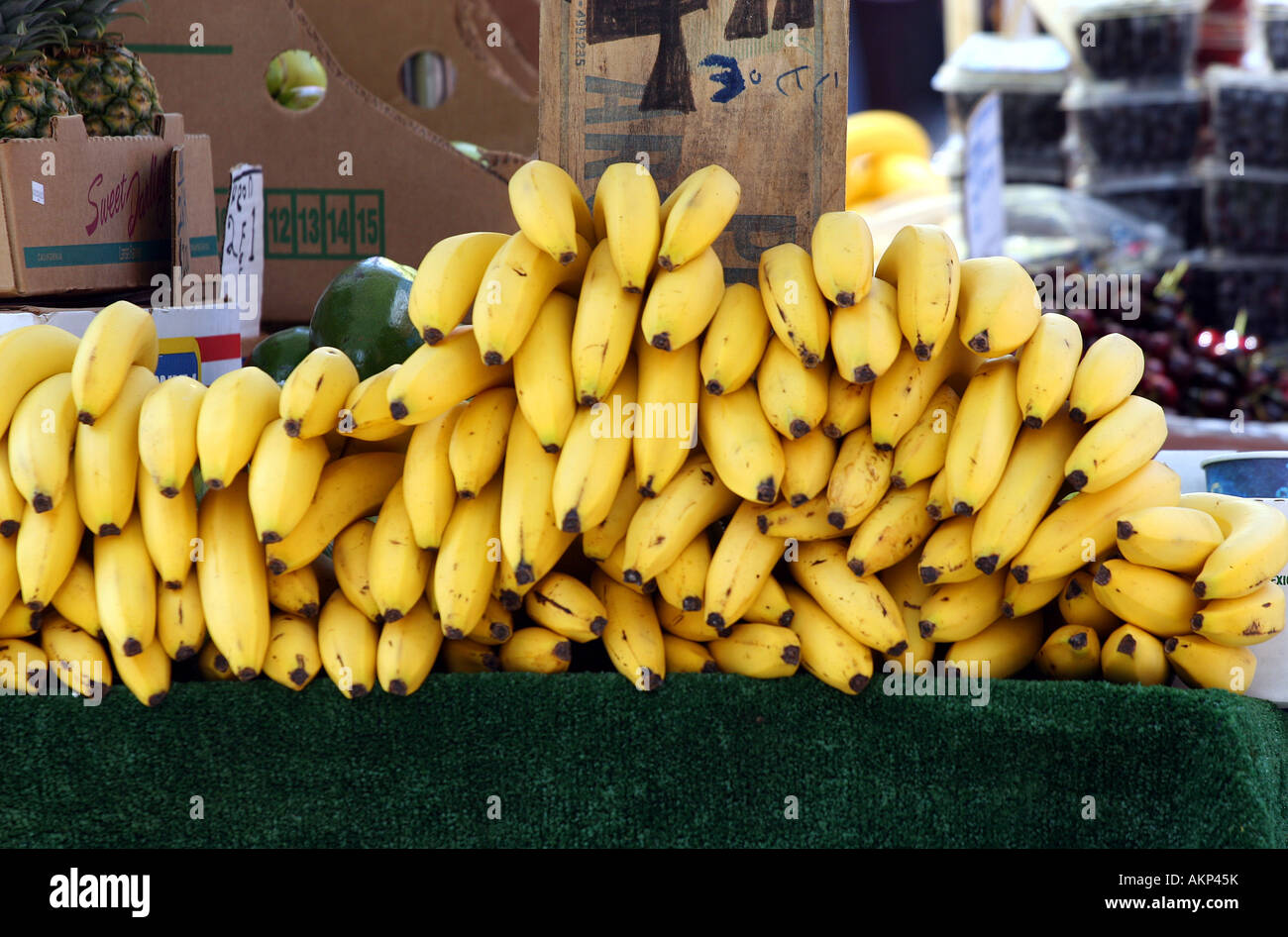 A bundle of bananas on sale at a street stall in Chelsea Stock Photo ...