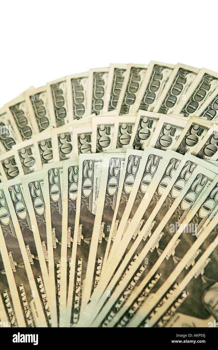 Layers of American money fanned out on white background Stock Photo - Alamy