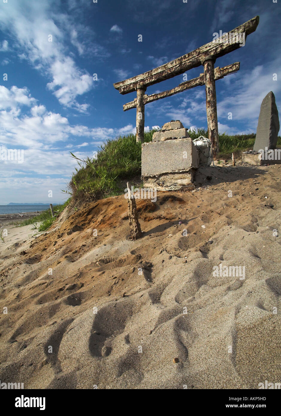 old Torii shrine gate on a beach in northern Japan, Aomori Stock Photo ...