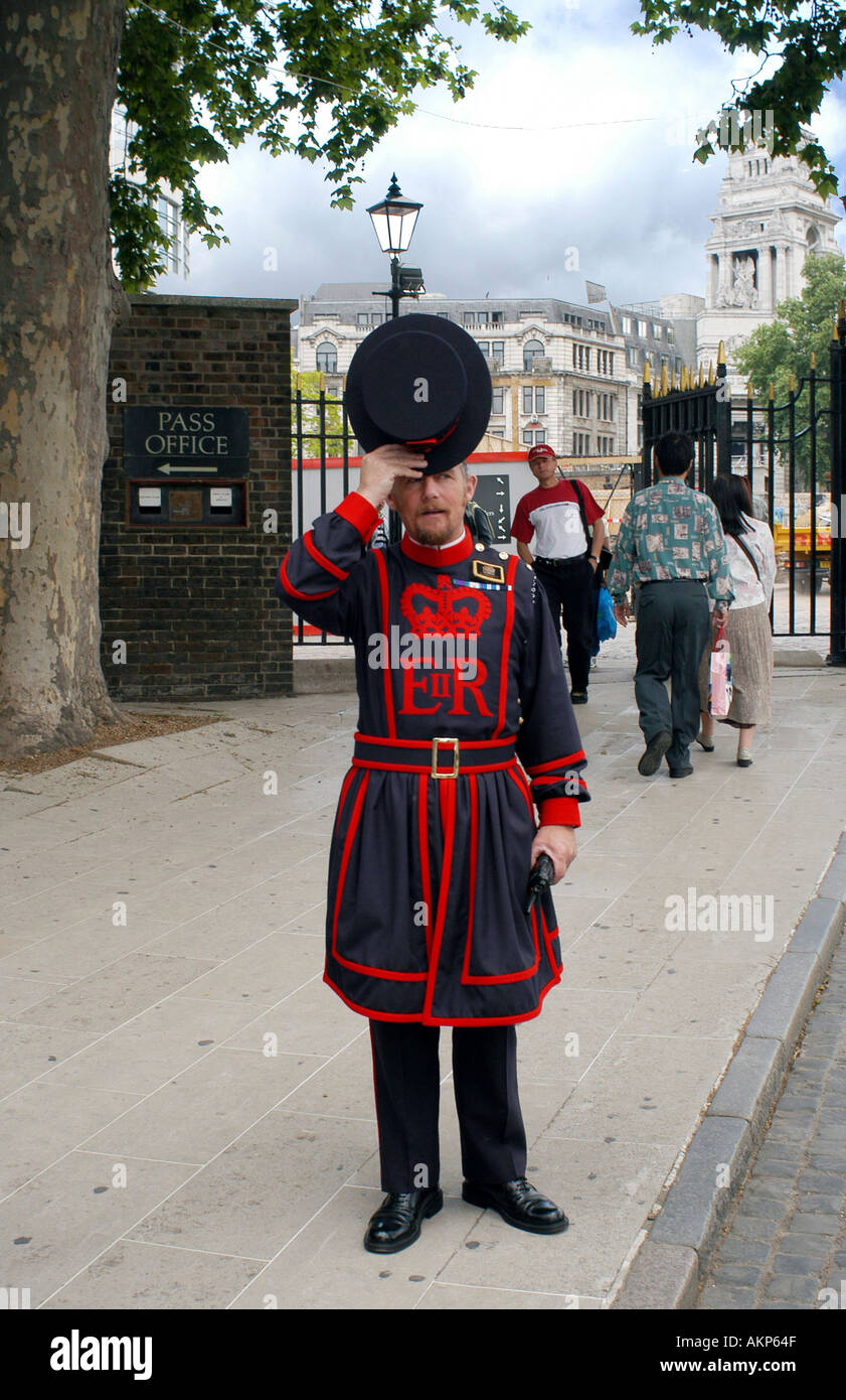 A Tower of London Beefeater in his black uniform Stock Photo - Alamy