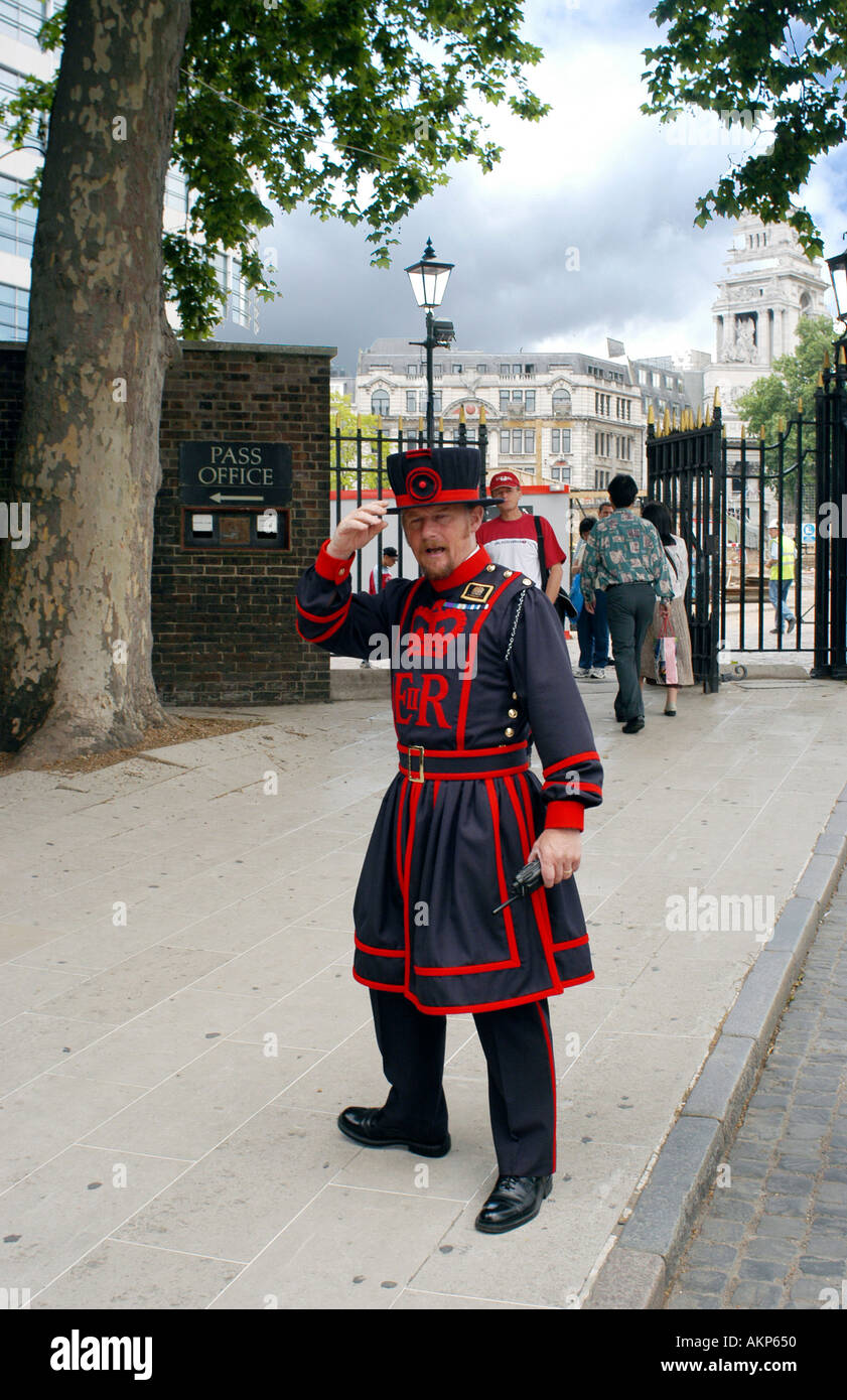 A Tower of London Beefeater in his black uniform Stock Photo - Alamy