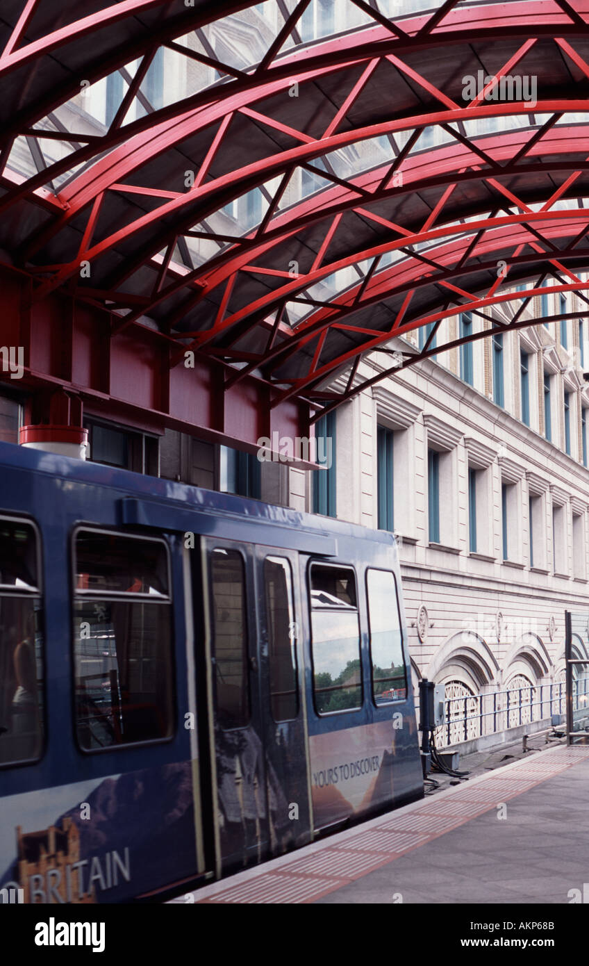 Train pulling into the platform of Canary Wharf station Docklands ...