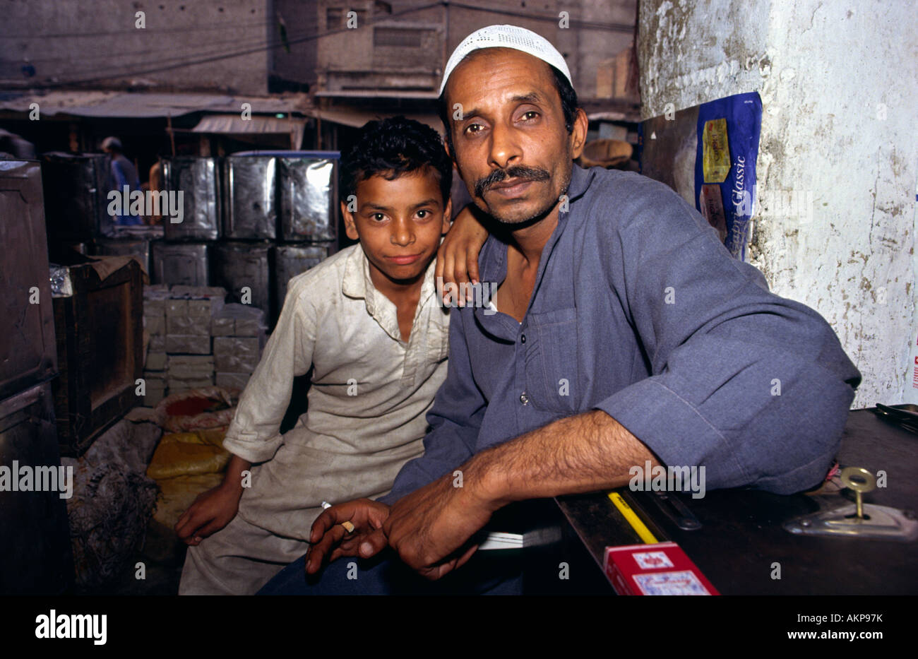 Shop owner and son. Rawalpindi, Punjab, Pakistan Stock Photo - Alamy