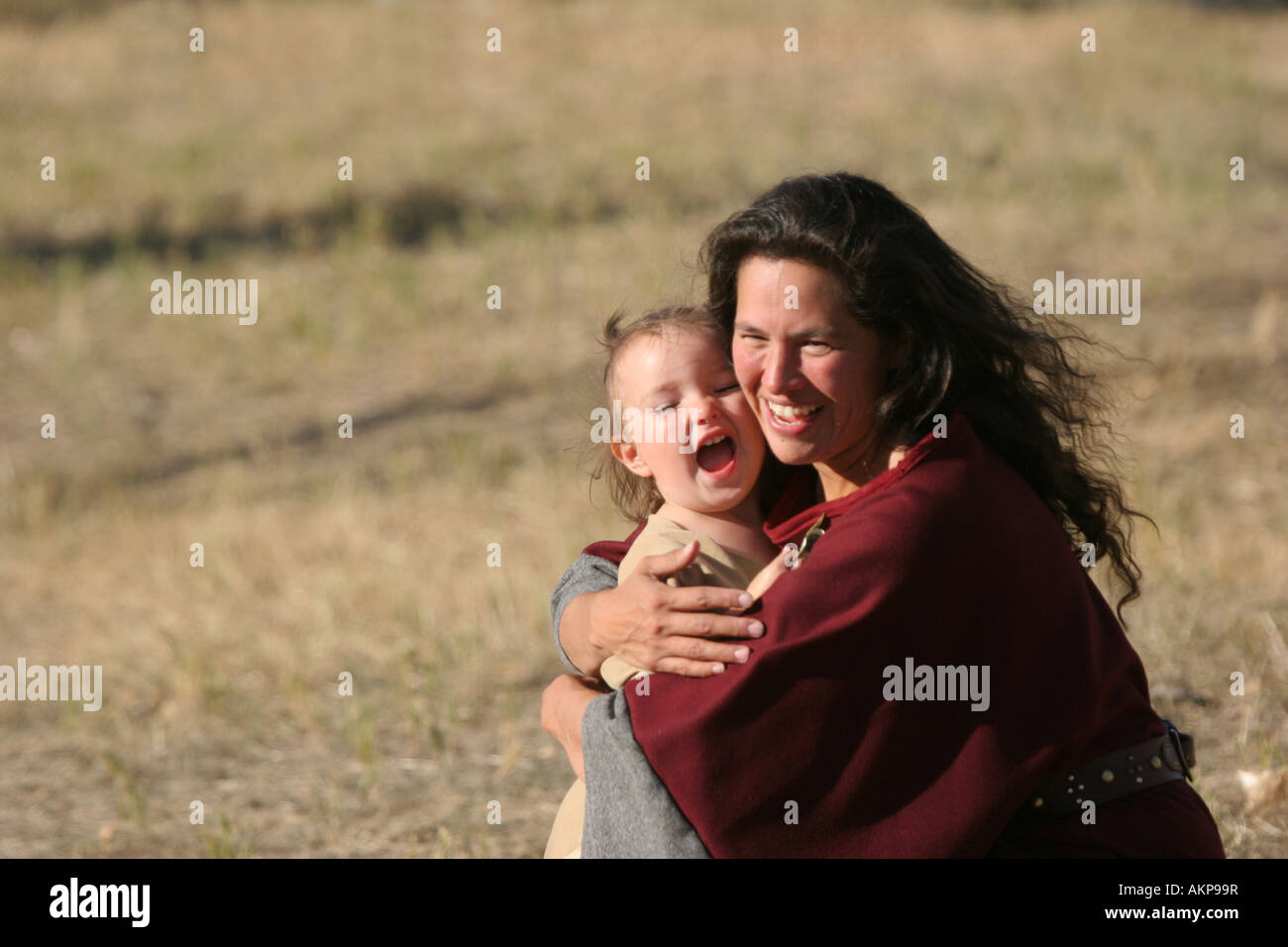 A Native American Indian Mother hugging her baby girl Stock Photo - Alamy