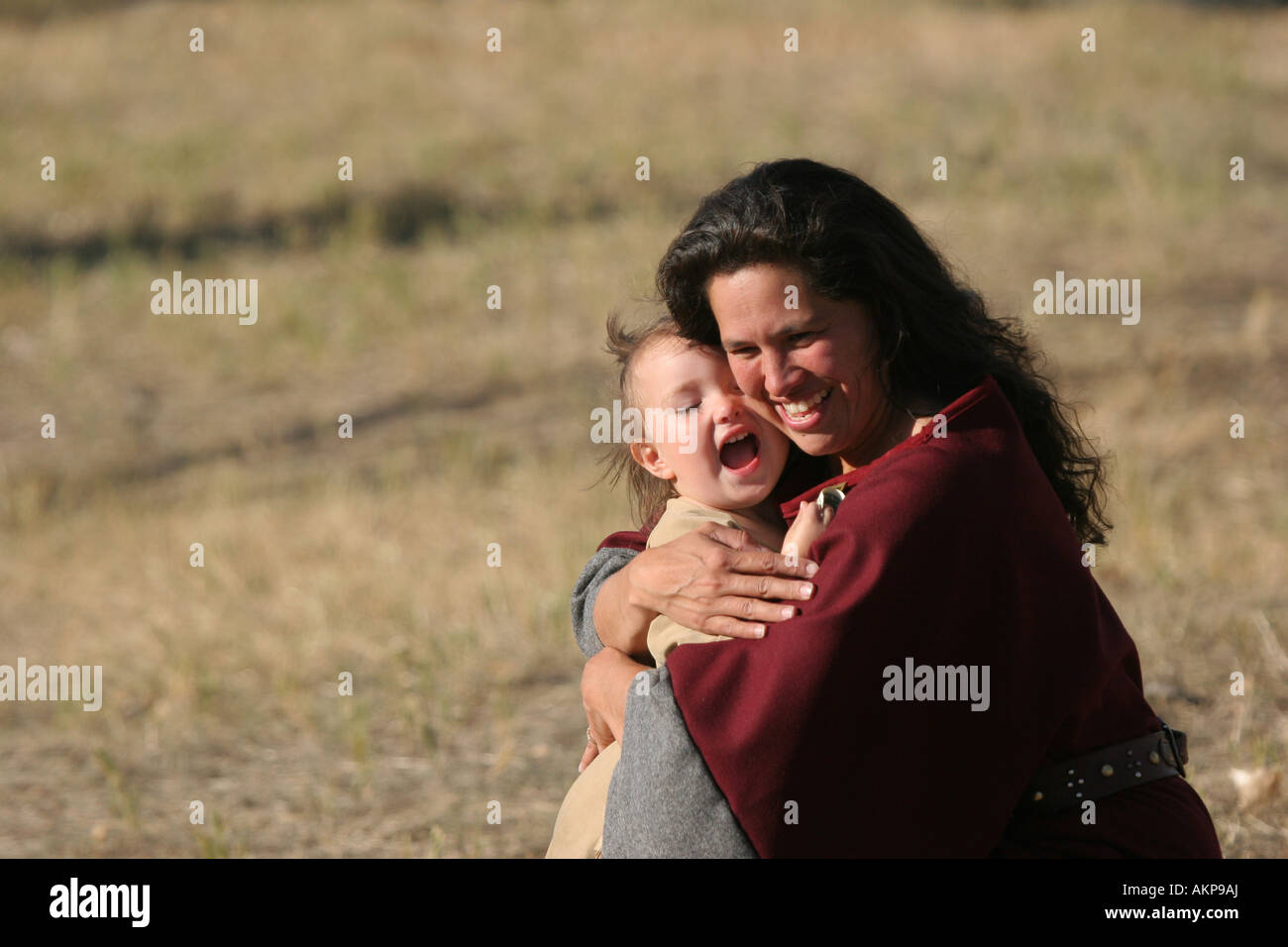 A Native American Indian Mother hugging her baby girl Stock Photo - Alamy